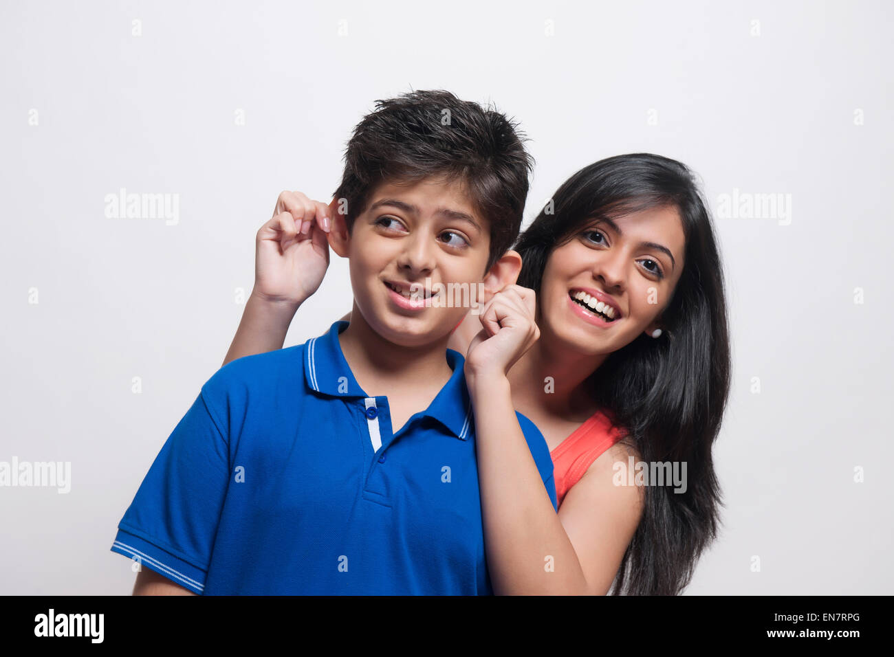 Holding two ears hi-res stock photography and images - Alamy