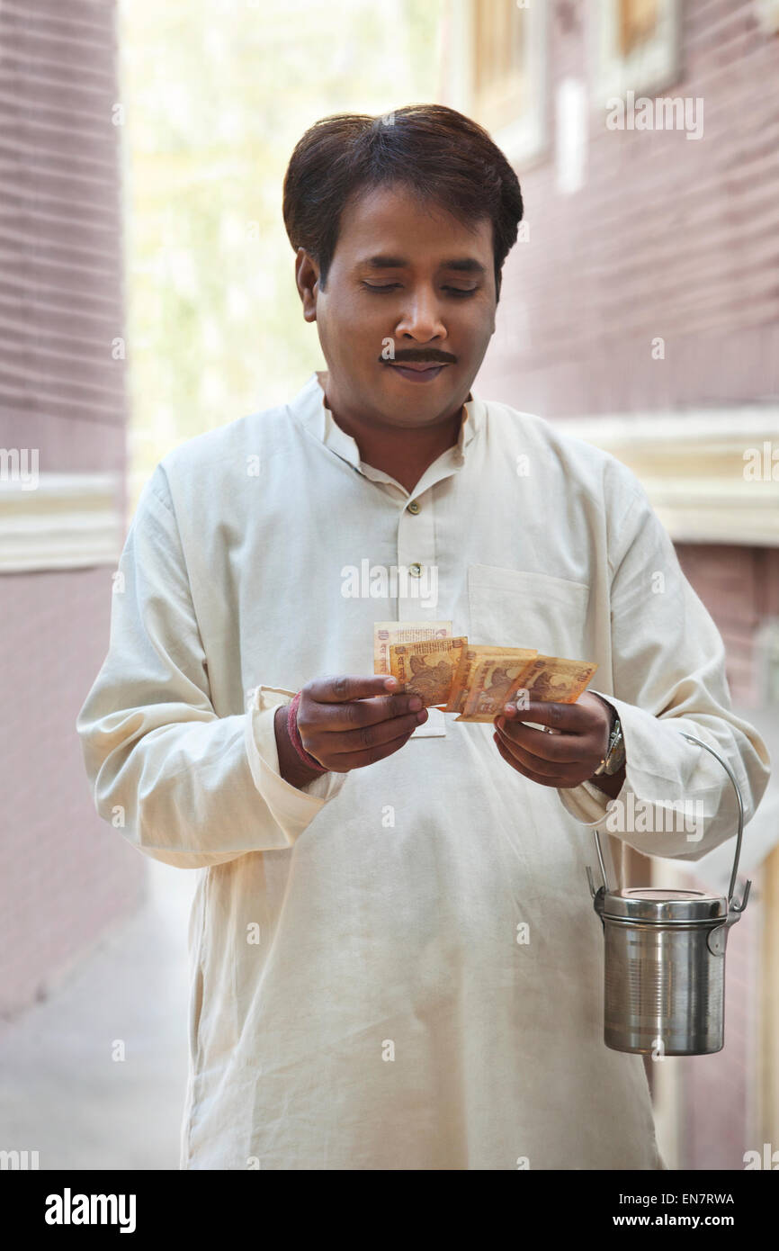 Indian rupees counting hi-res stock photography and images - Alamy