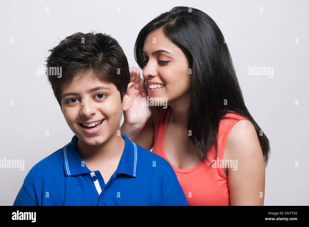 Two boys whispering hi-res stock photography and images - Alamy