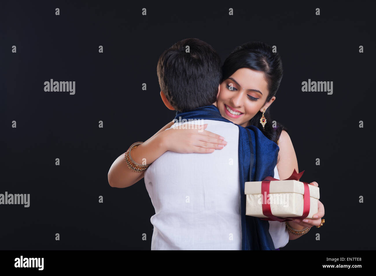 Brother sister hugging rear view hi-res stock photography and images ...