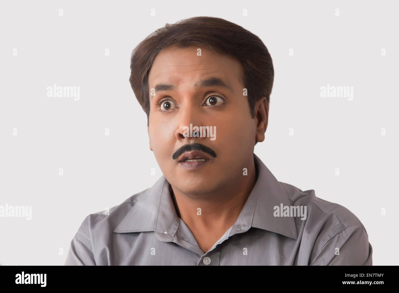 Close up portrait of a surprised man on a white background Stock Photo ...