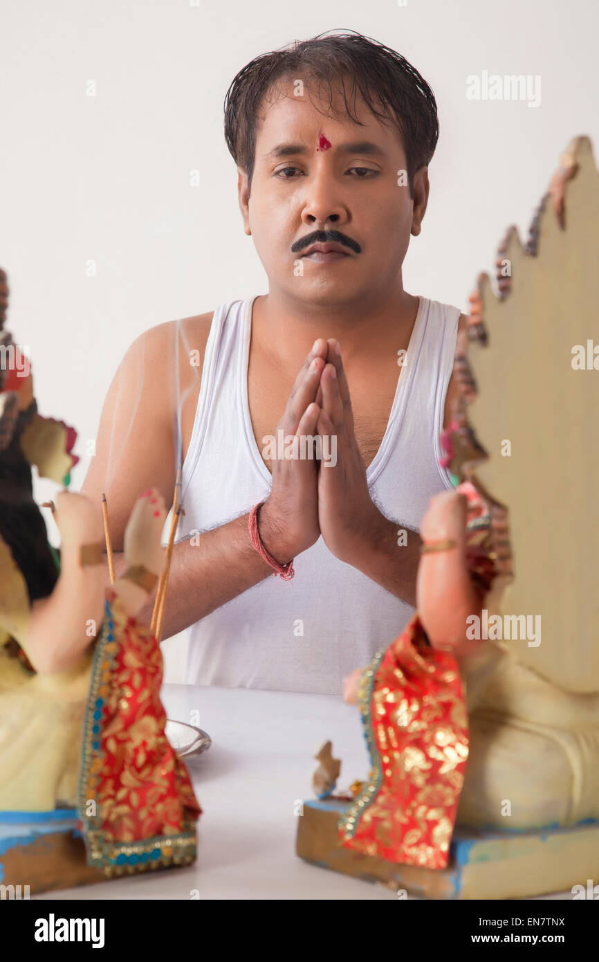 Man praying to god Stock Photo - Alamy