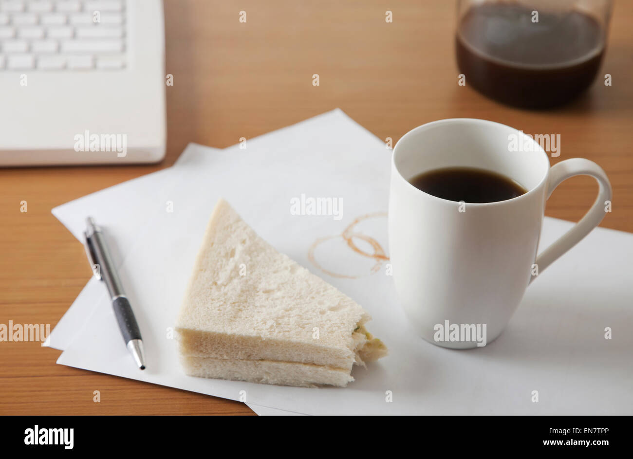Coffee and sandwich on desk Stock Photo - Alamy