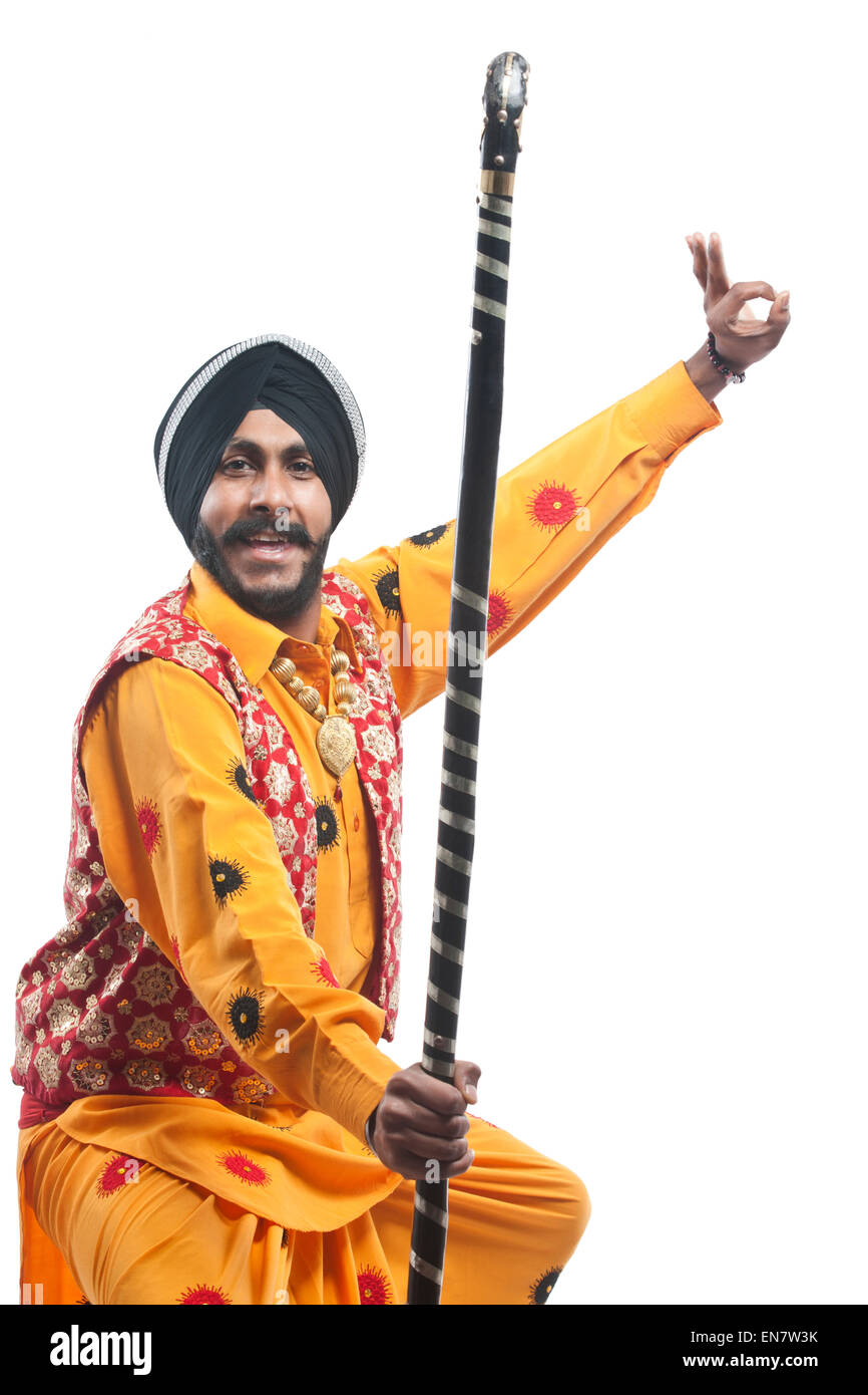 Portrait of Sikh man doing bhangra dance Stock Photo - Alamy