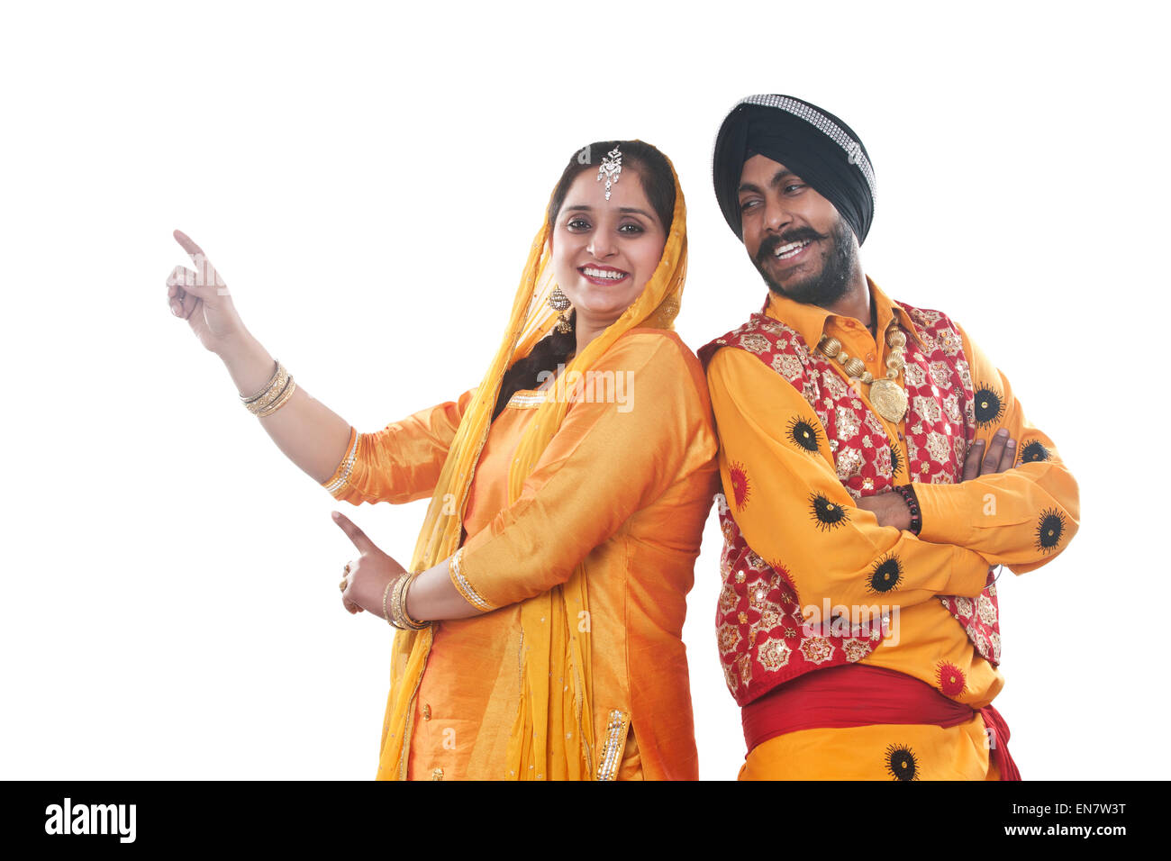 Portrait of Sikh couple standing back to back Stock Photo - Alamy