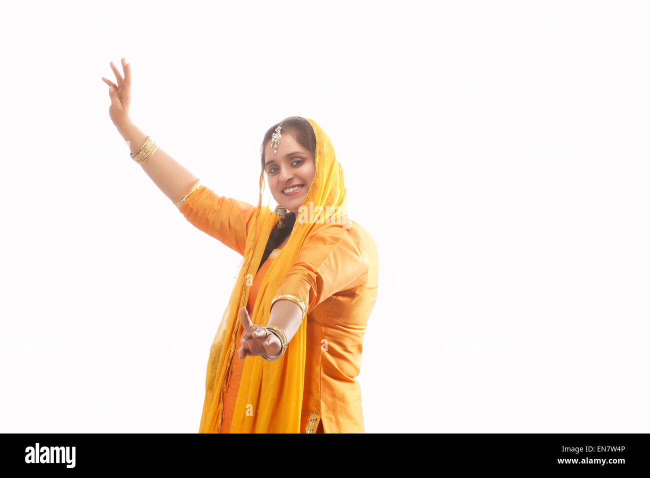 Portrait of Sikh woman doing bhangra dance Stock Photo - Alamy