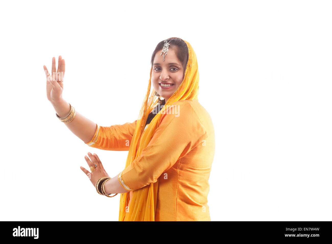 Portrait of Sikh woman doing bhangra dance Stock Photo - Alamy