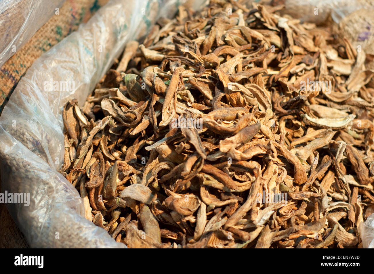 Close-up of dried mango skin for sale at the market Stock Photo - Alamy