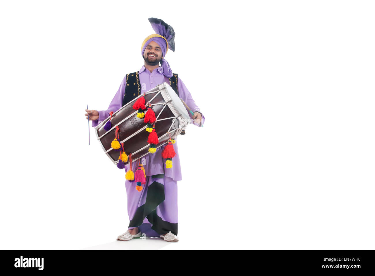 Portrait of Sikh man playing on drums Stock Photo - Alamy