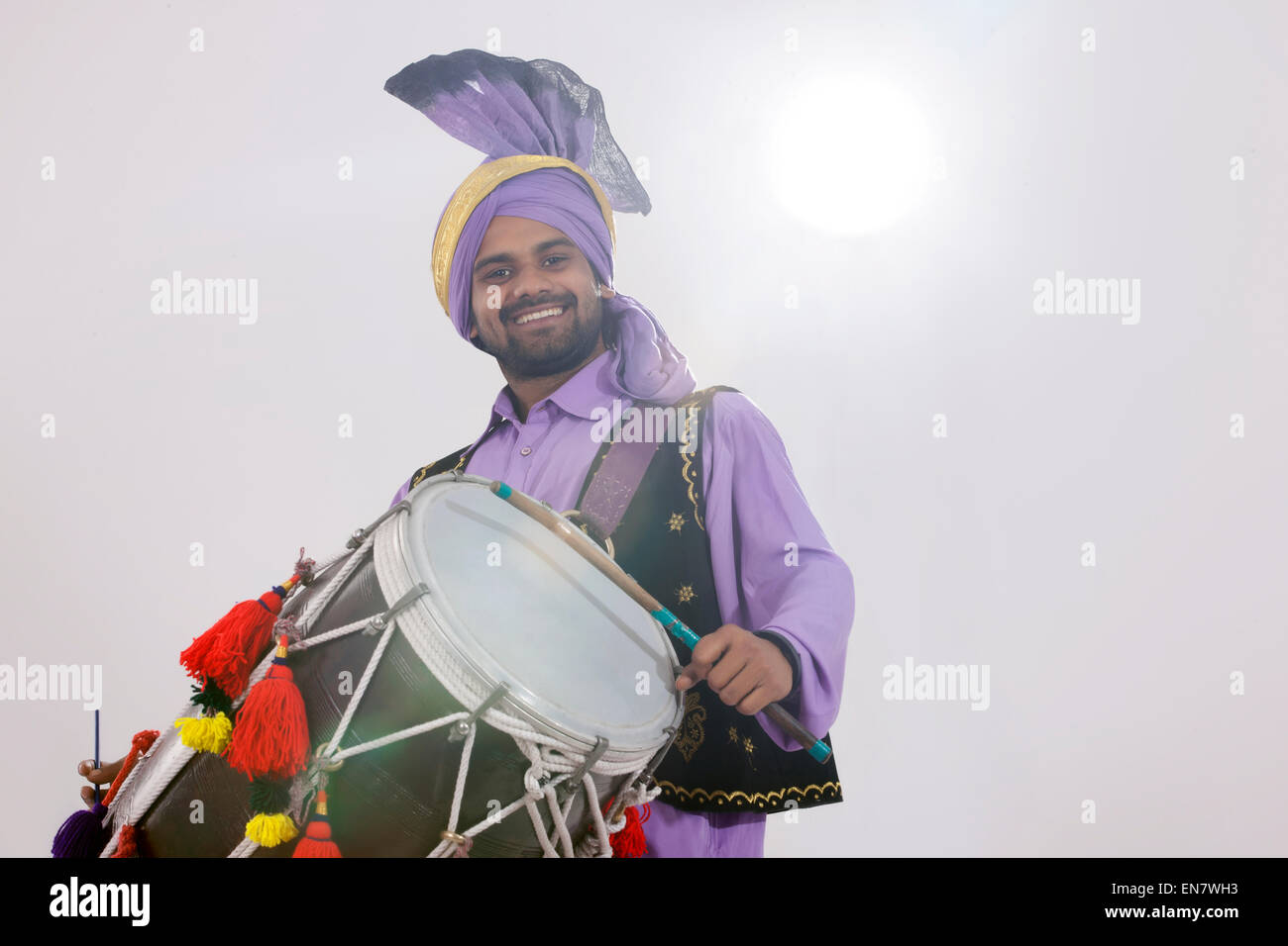 Portrait of Sikh man playing on drums Stock Photo - Alamy