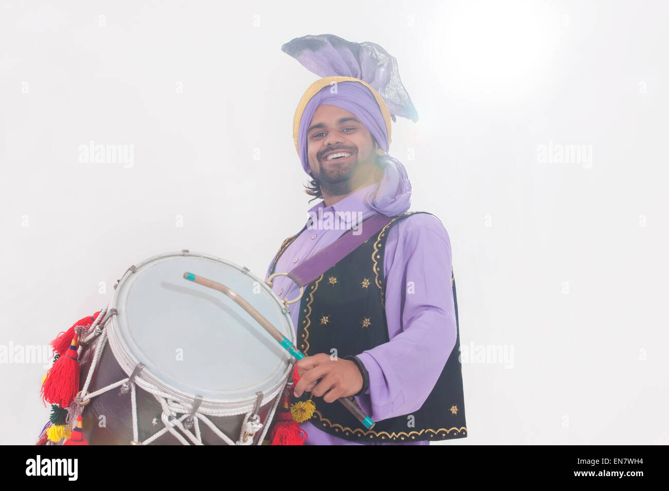 Portrait of Sikh man playing on drums Stock Photo - Alamy