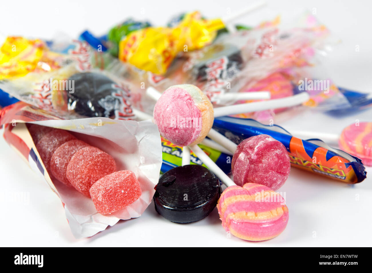 Random selection of kids sweets on white background Stock Photo - Alamy