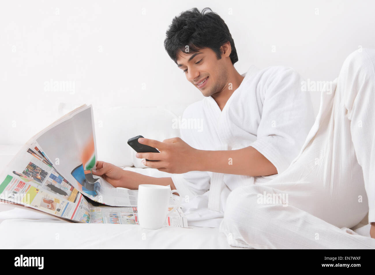 Young man texting Stock Photo - Alamy