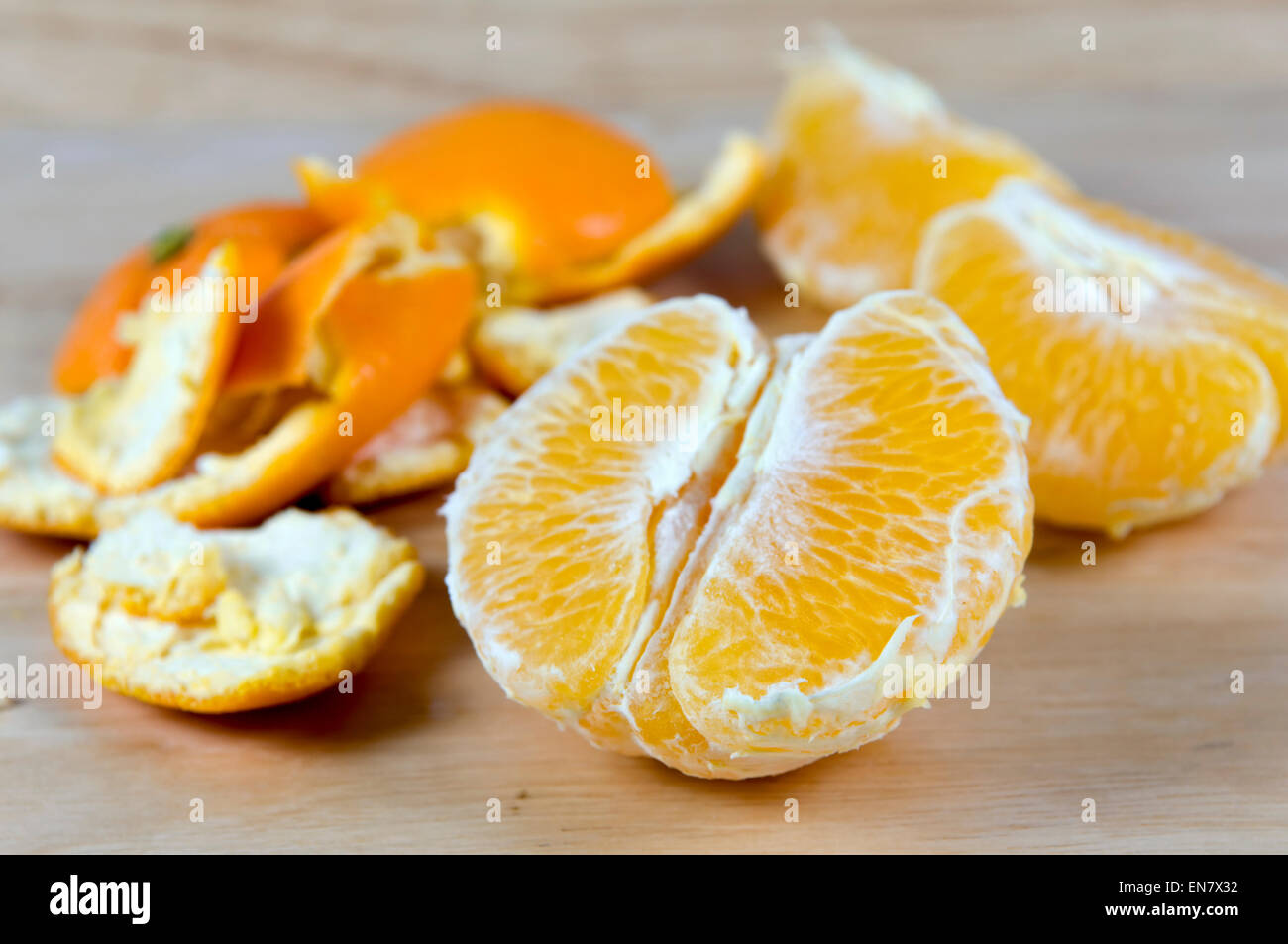 Half peeled orange hi-res stock photography and images - Alamy