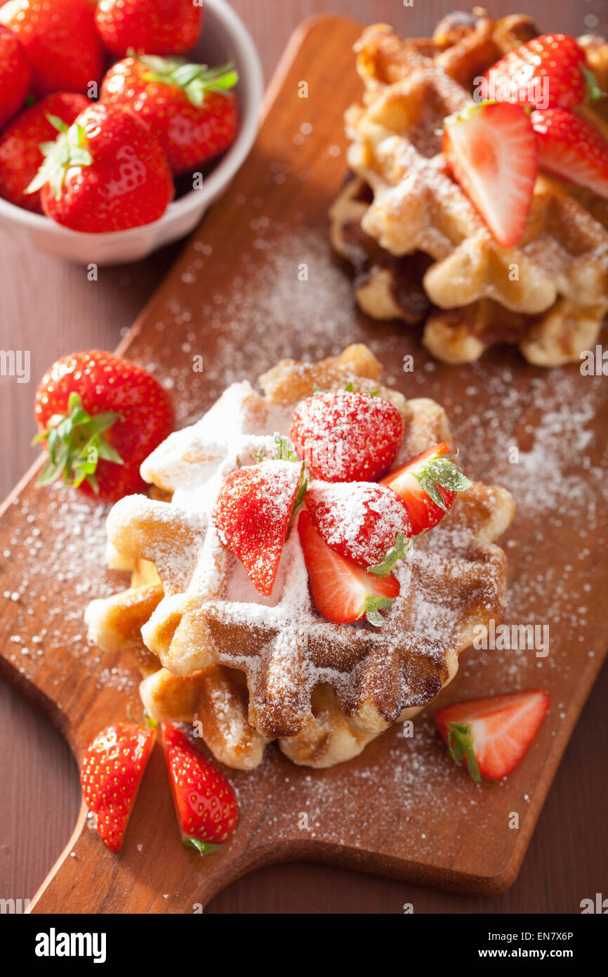 belgian waffles with icing sugar and strawberry Stock Photo - Alamy