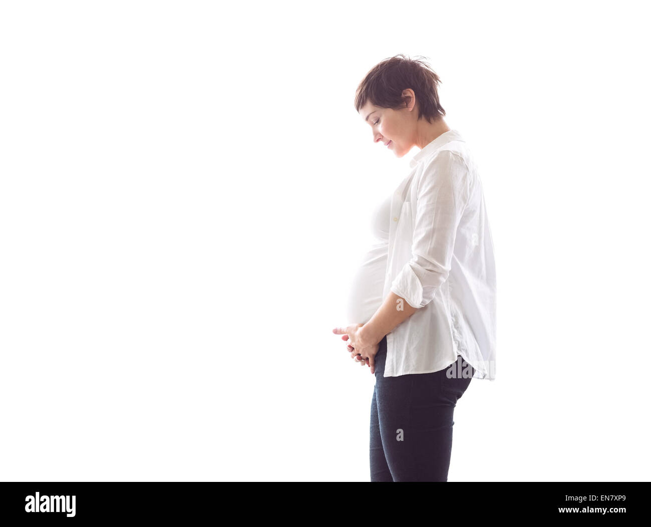 Pretty pregnant woman smiling Cut Out Stock Images & Pictures - Alamy