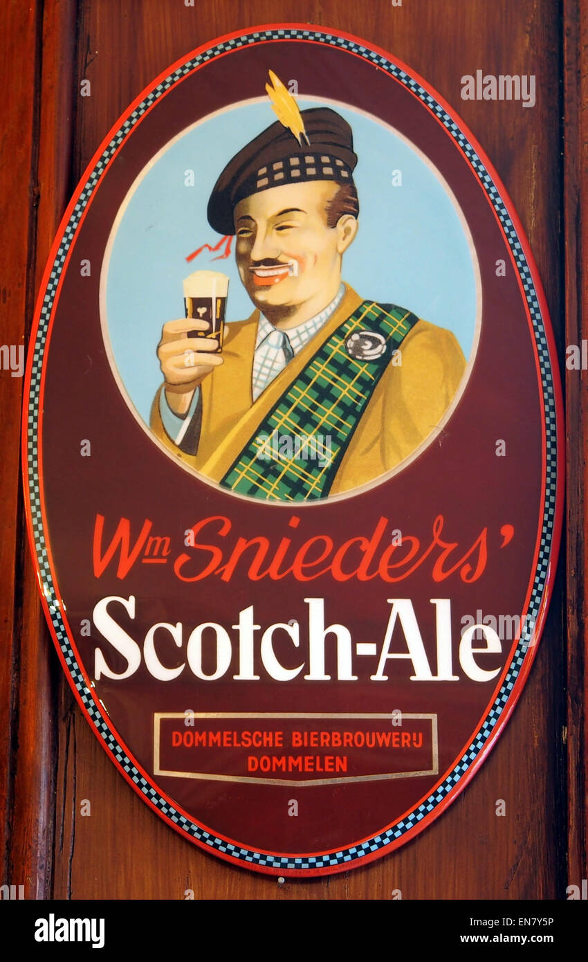 A vintage metal advertising sign for Wm Snieders Scotch-Ale, showcasing ...