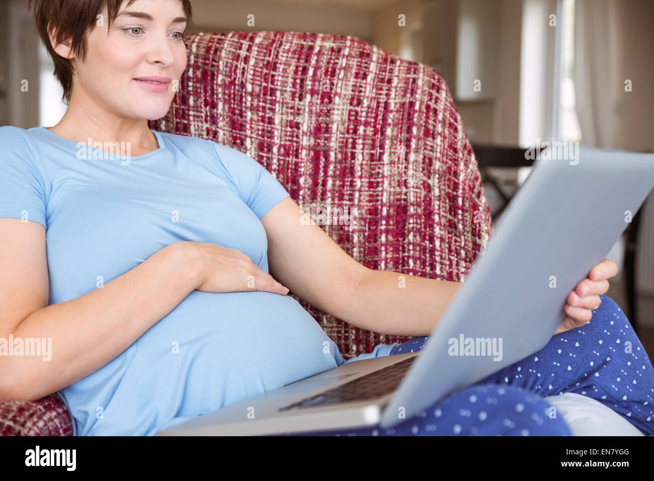 Beautiful pregnant woman laptop sitting hi-res stock photography and ...