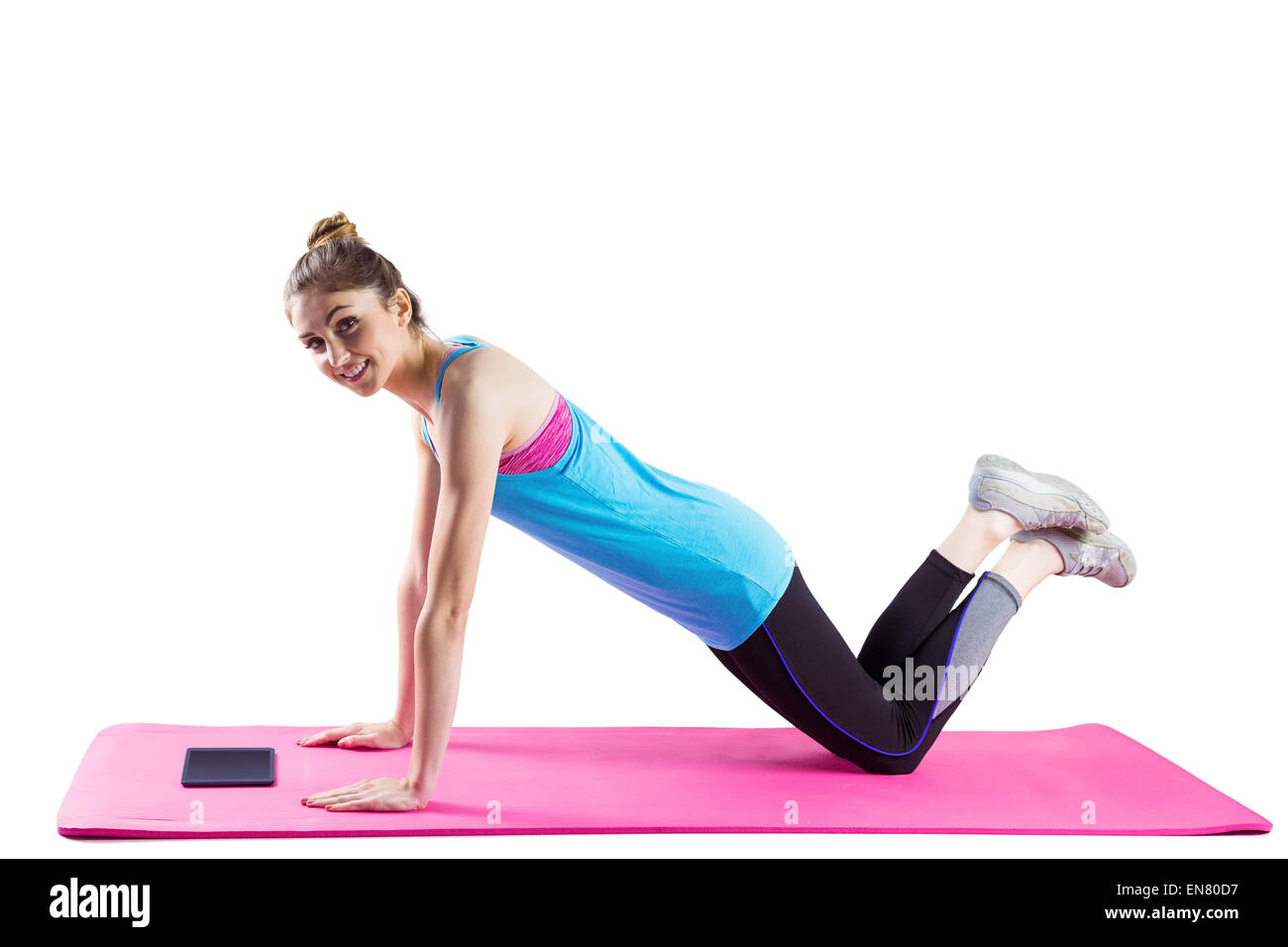 Fit woman doing press up on mat Stock Photo - Alamy
