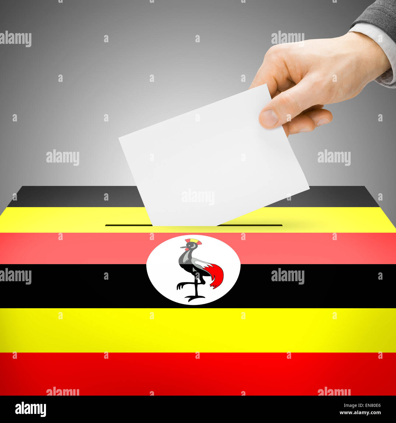 Ballot box painted into national flag colors - Uganda Stock Photo - Alamy