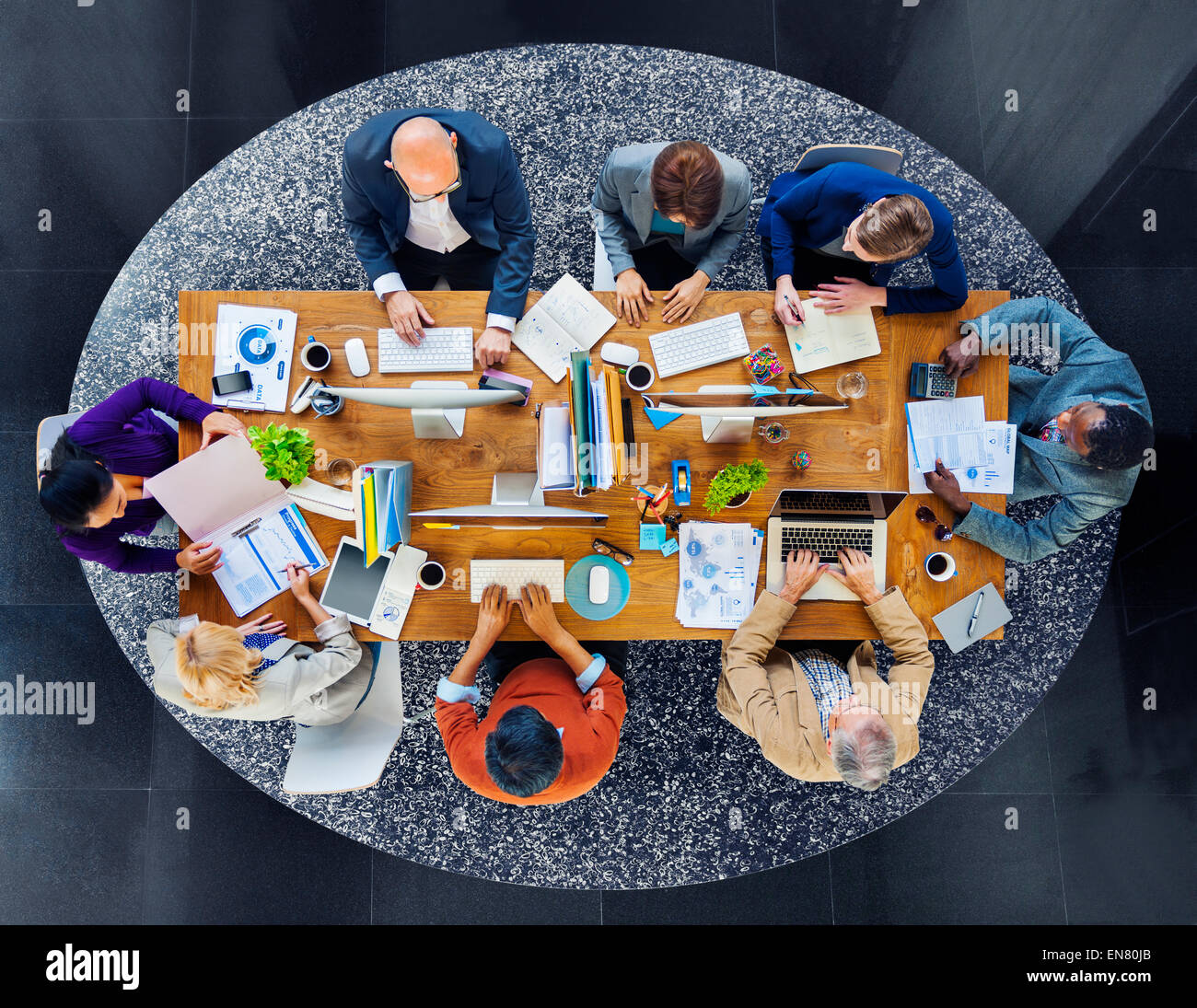 Multiethnic Group of People in Meeting Stock Photo - Alamy