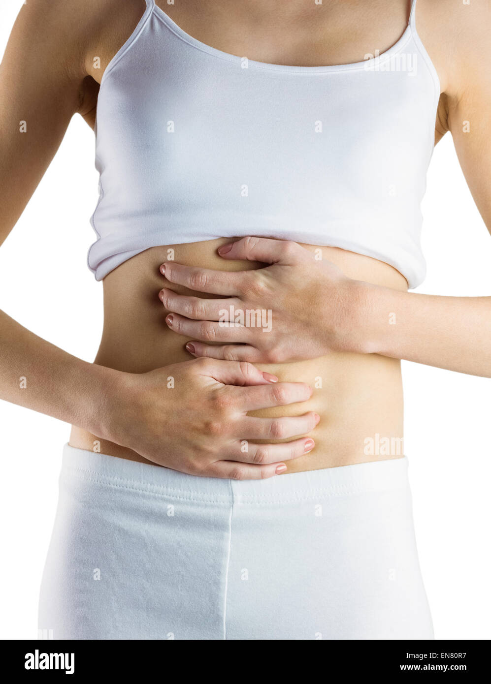Slim woman touching her belly Stock Photo - Alamy