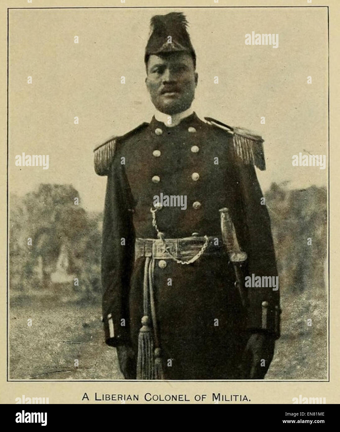This 1907 image by Johnston depicts a Liberian colonel of the militia ...