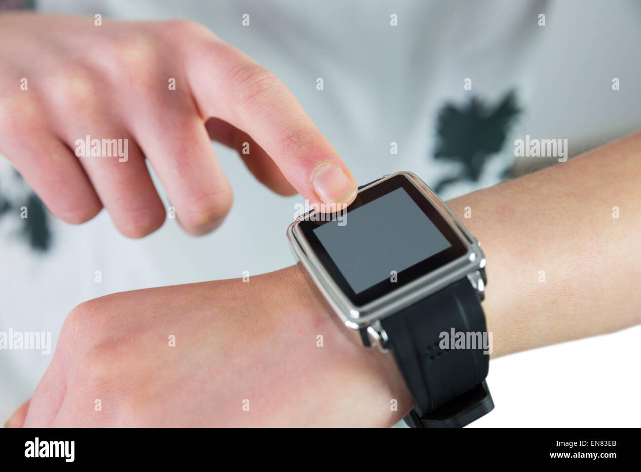 Woman using her smartwatch Stock Photo - Alamy