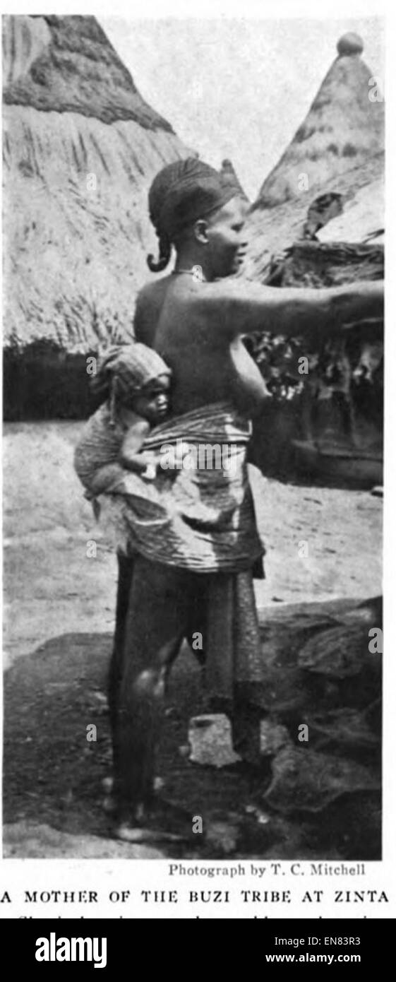 A 1922 photograph depicting a woman from the Buzi Tribe. The image ...