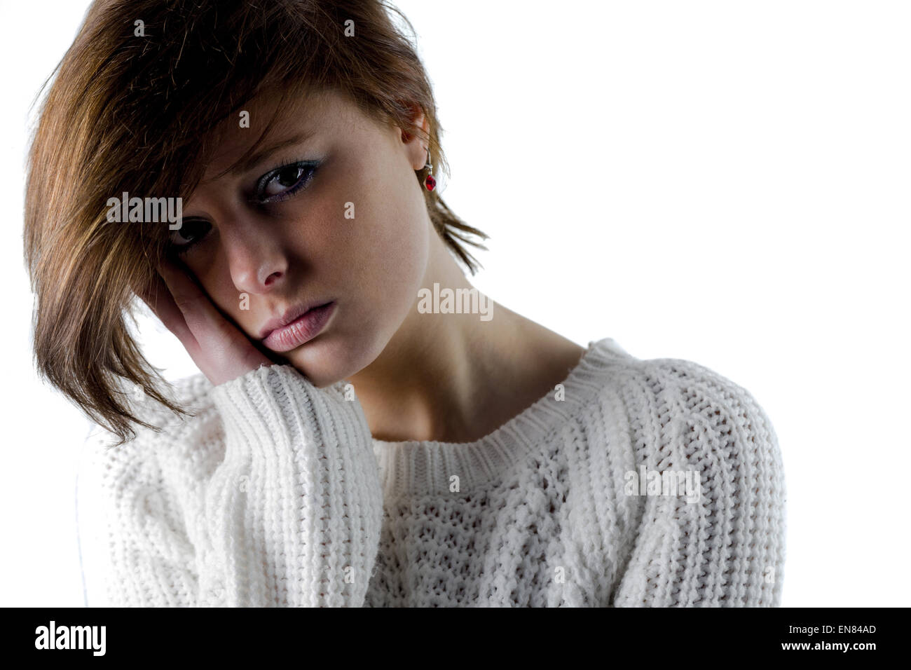 Pretty brunette feeling sad Stock Photo - Alamy