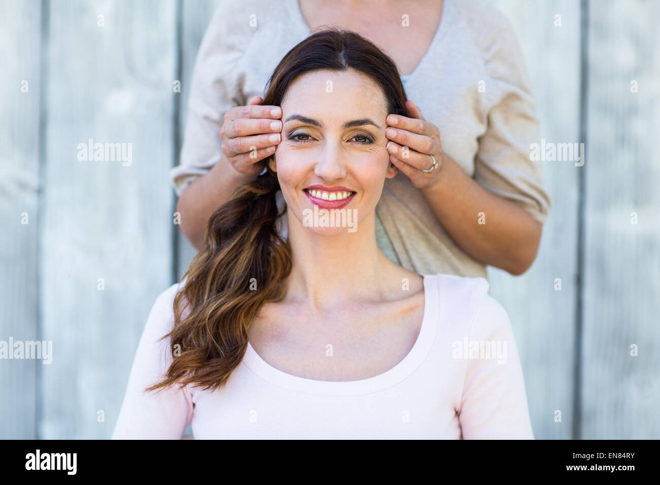 Woman temples smiling hi-res stock photography and images - Alamy