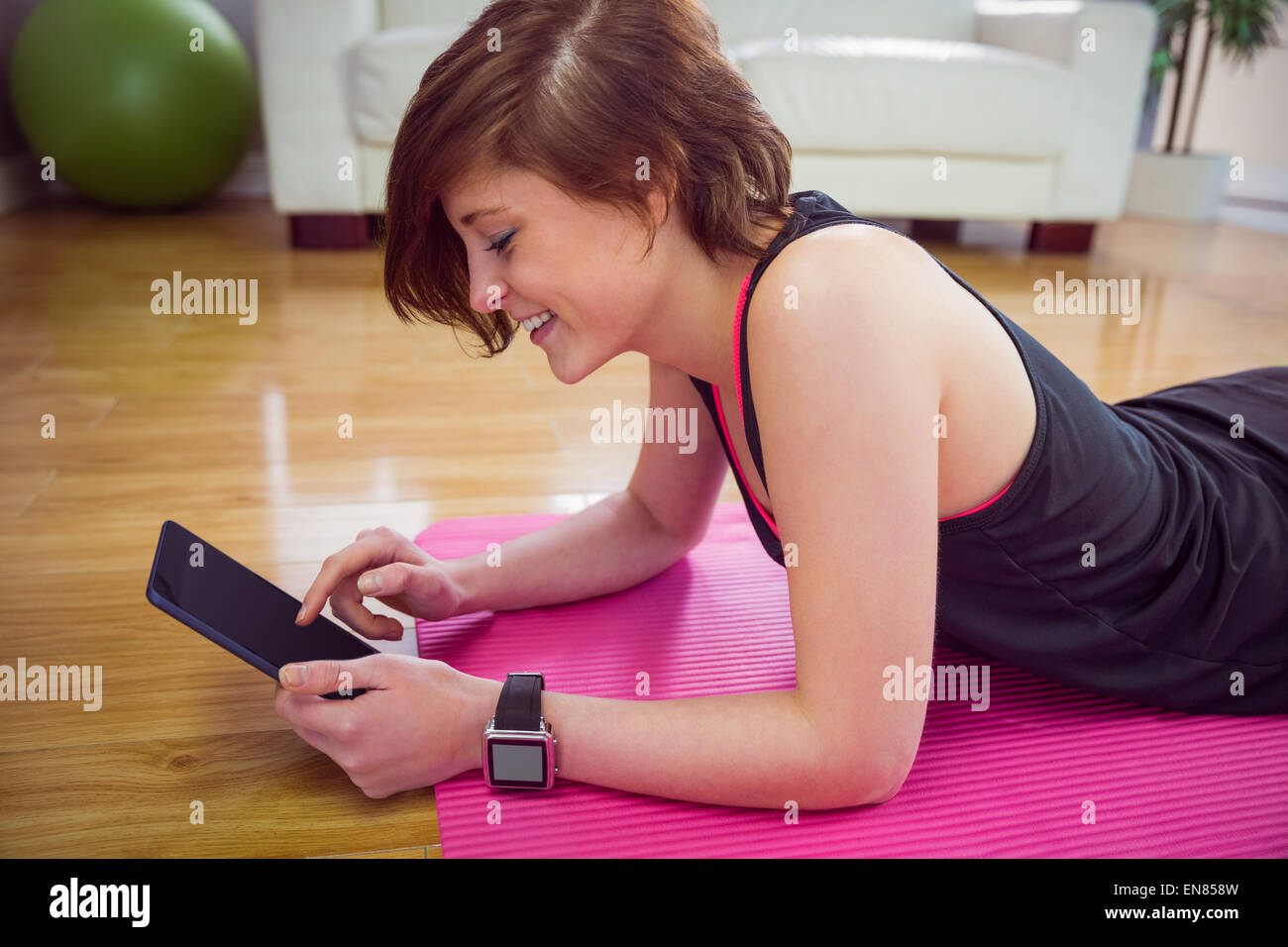 Woman watch on tablet home hi-res stock photography and images - Alamy