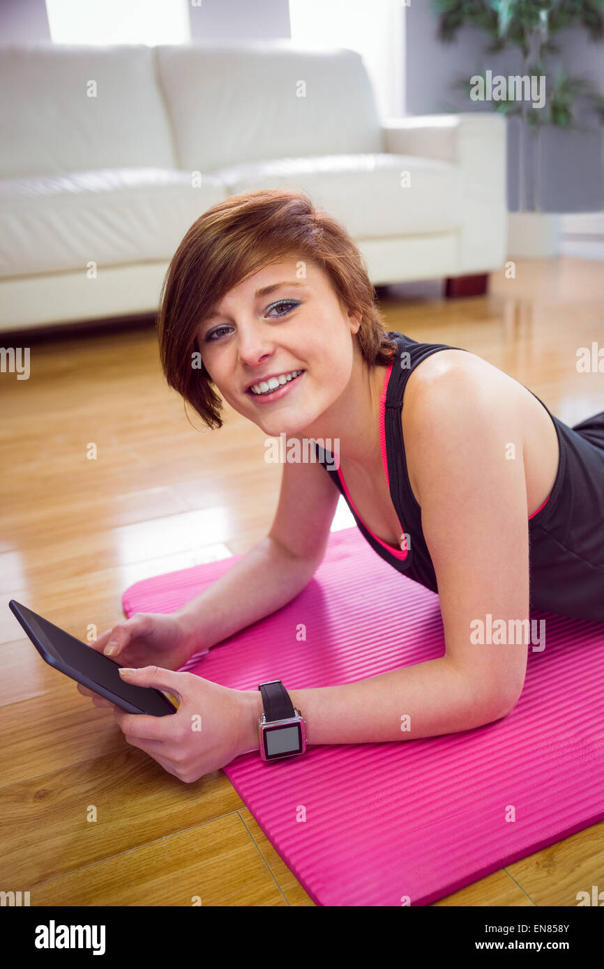 Woman fit looking at watch hi-res stock photography and images - Alamy