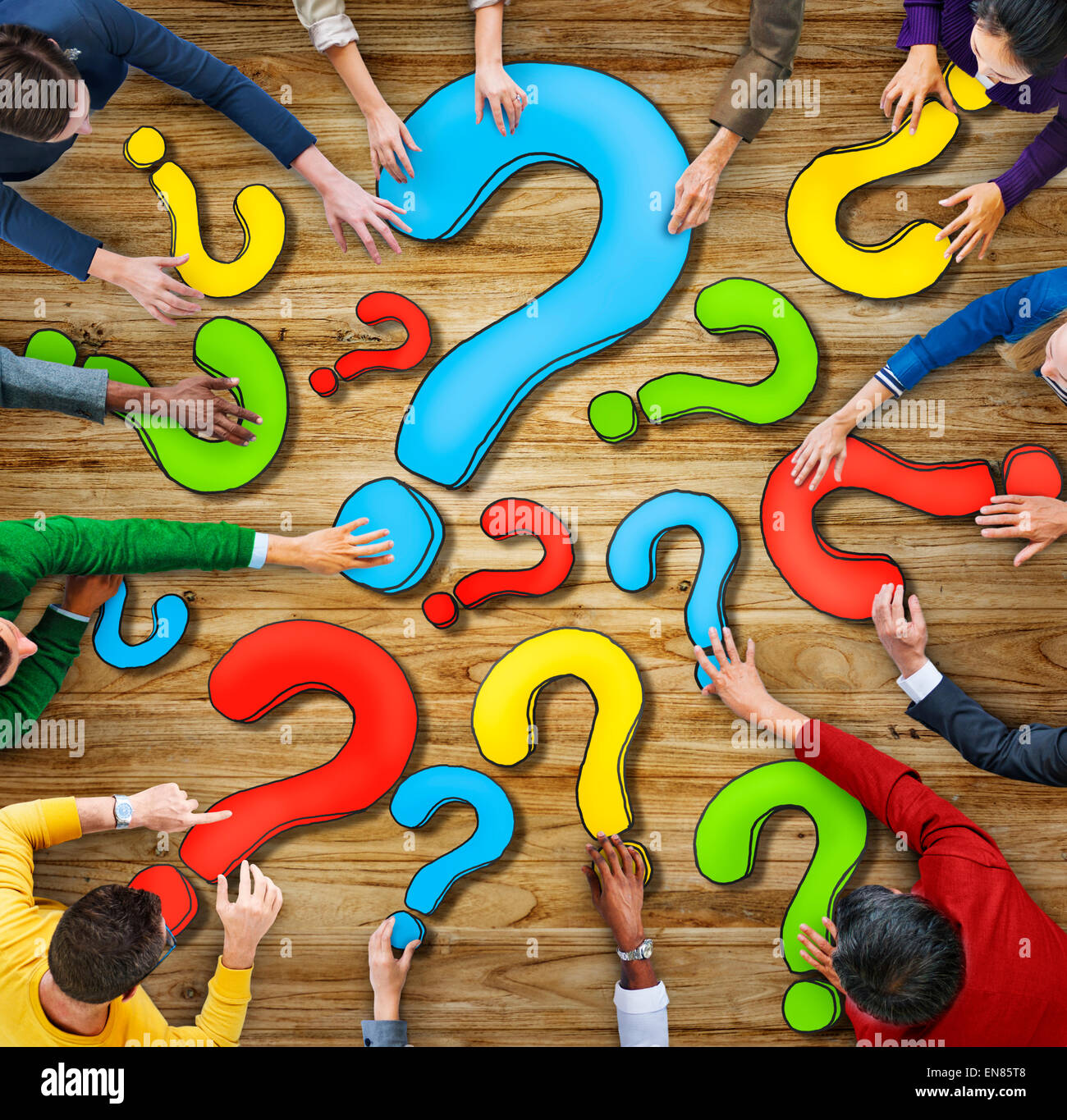 Multiethnic Group of People with Question Mark Stock Photo - Alamy
