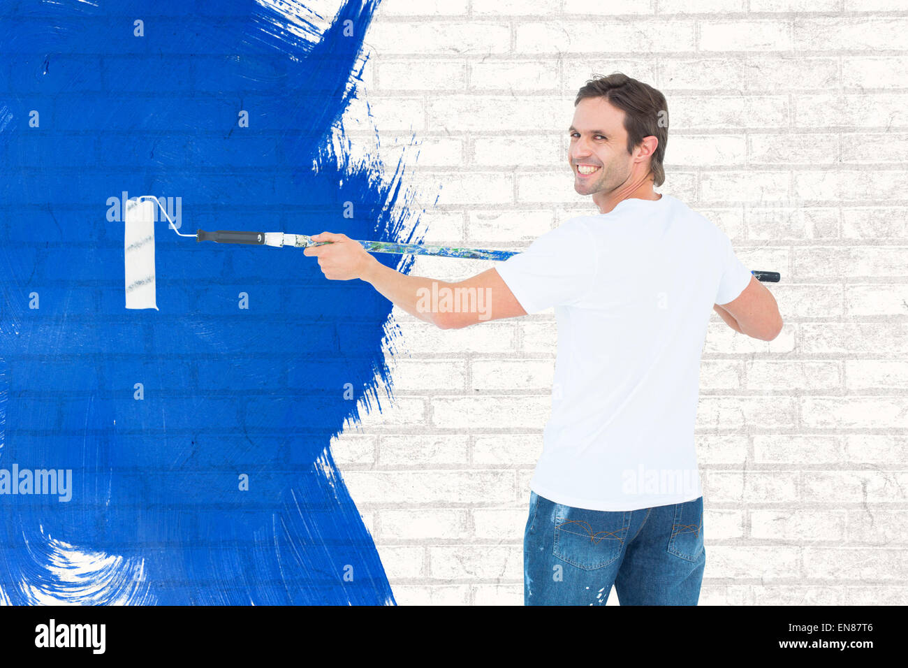 Man using roller hi-res stock photography and images - Alamy