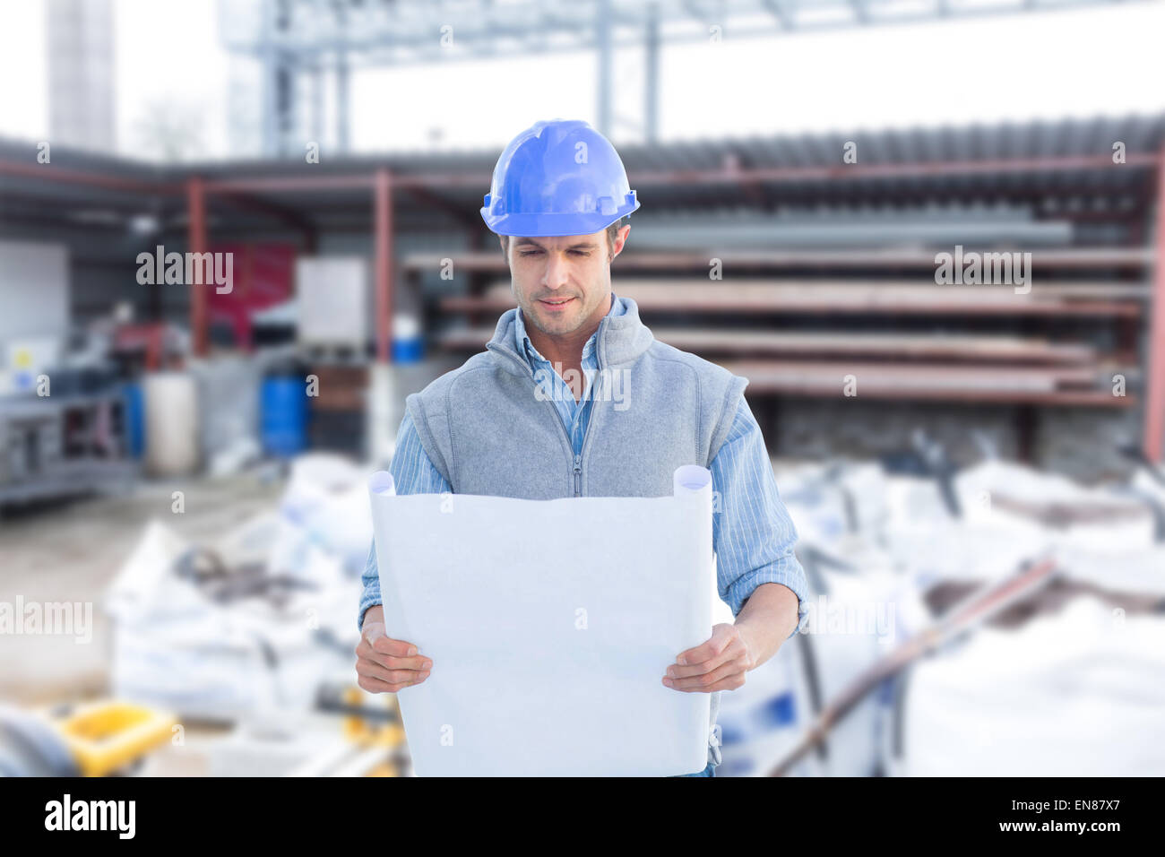 Composite image of architect reading blueprints Stock Photo - Alamy