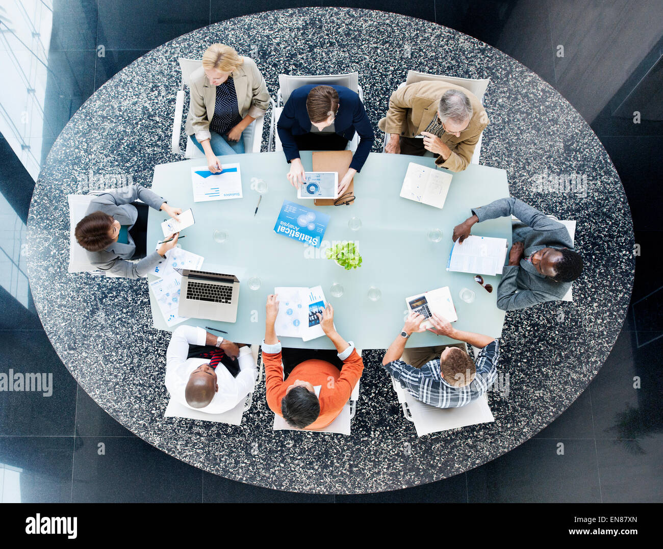 Group of Business People Discussing Statistical Analysis Stock Photo ...