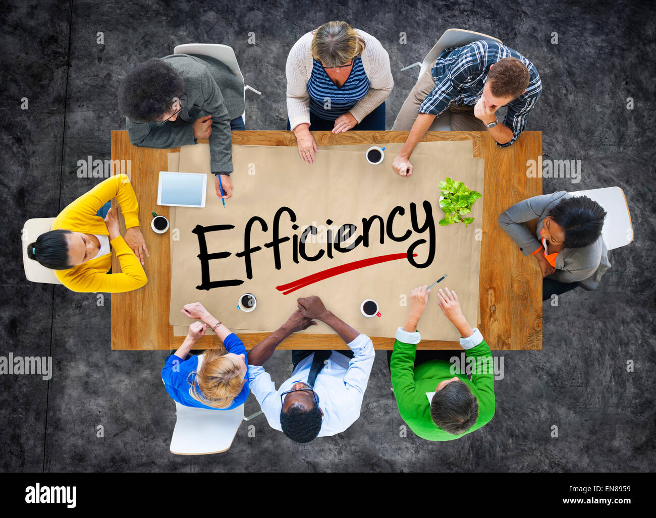Multiethnic Group of People Discussing About Efficiency Stock Photo - Alamy