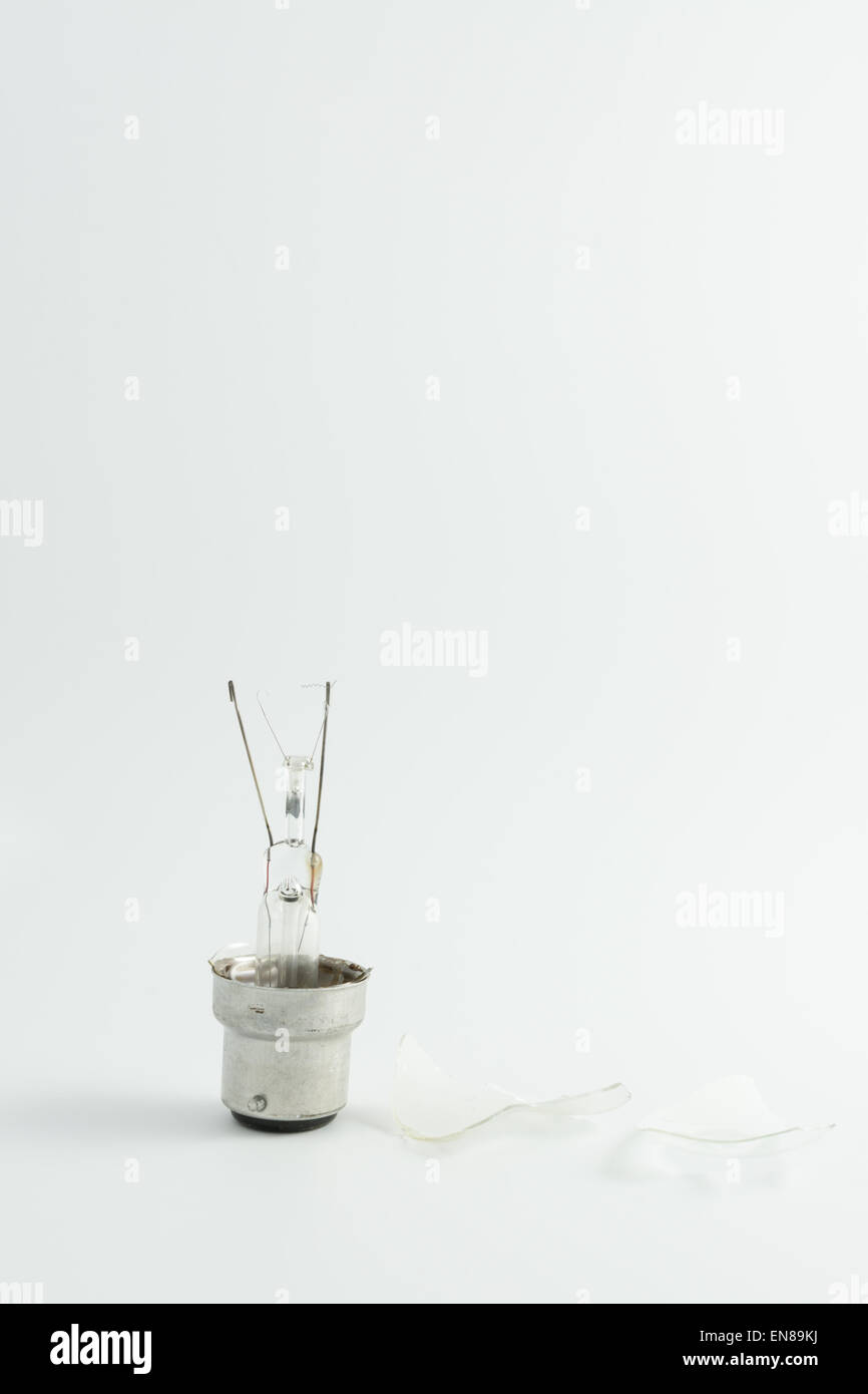 Burnout concept - shattered traditional electric lightbulb Stock Photo ...