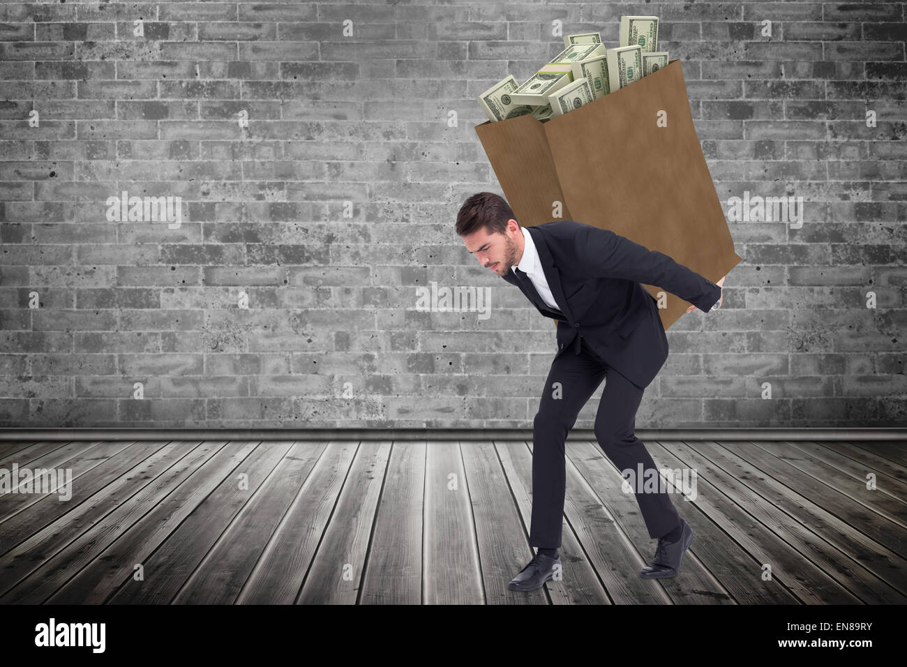 Man carrying something heavy hi-res stock photography and images - Alamy