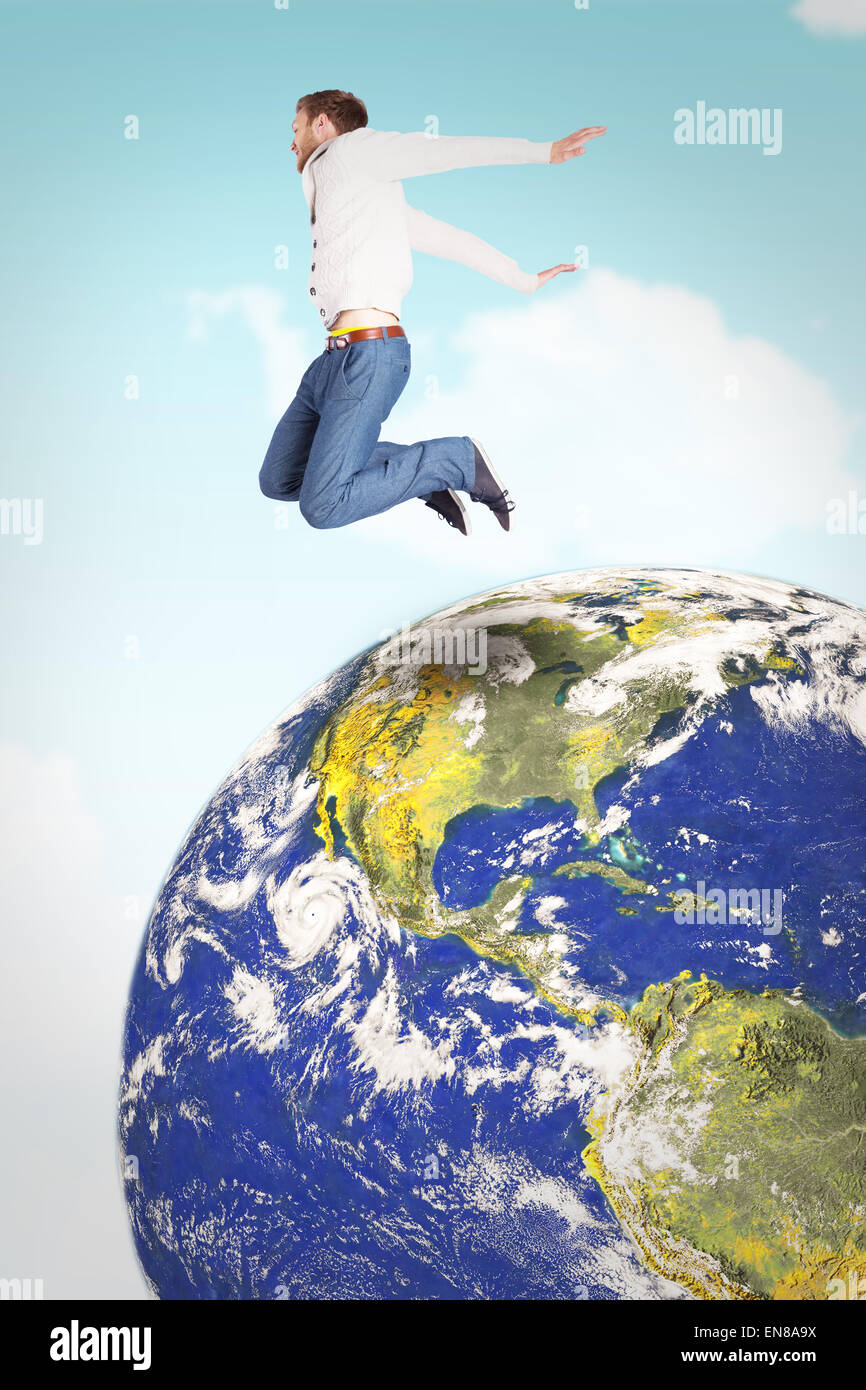 Composite image of full length of cheerful young man jumping Stock ...