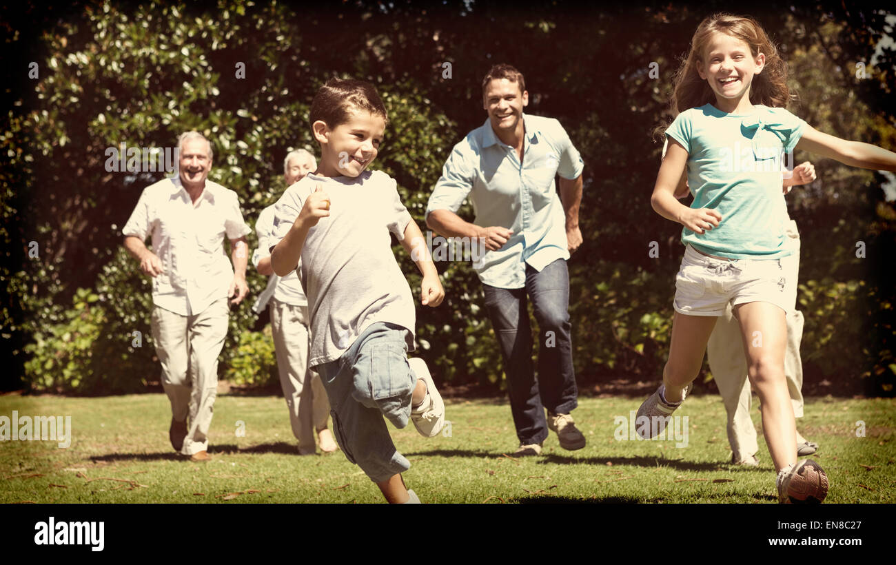 Happy multi generation family racing towards camera Stock Photo - Alamy