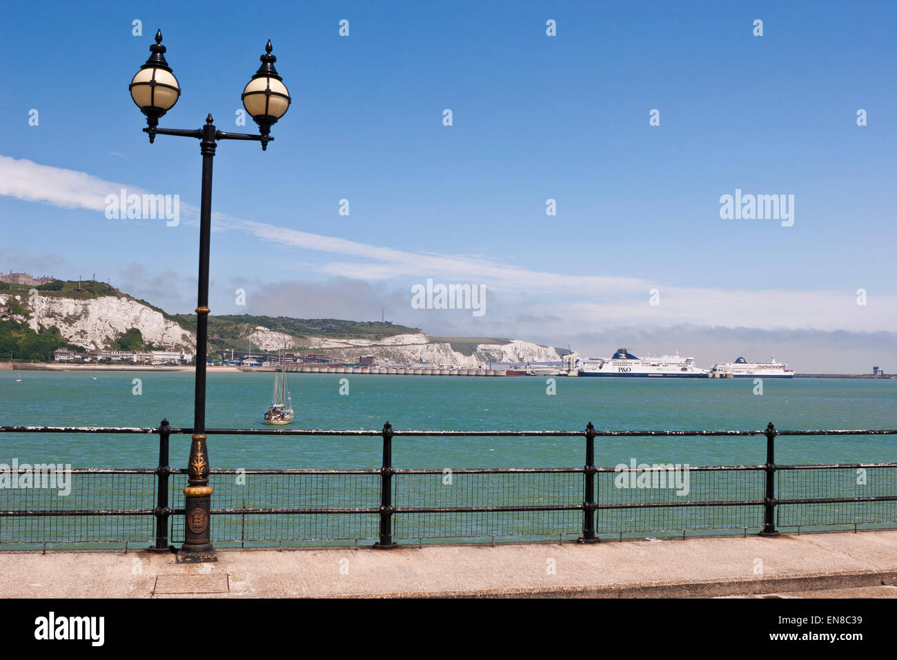 The coastline of the white Dover cliffs with two P&O ferries in the ...