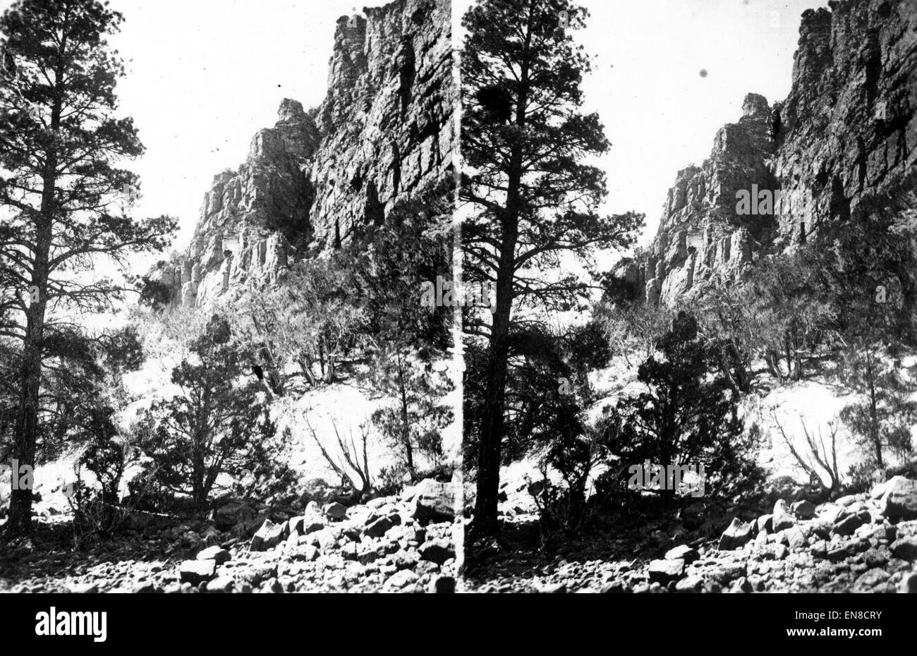 This photograph from 1871 shows the rugged, rocky wall of Red Canyon in ...