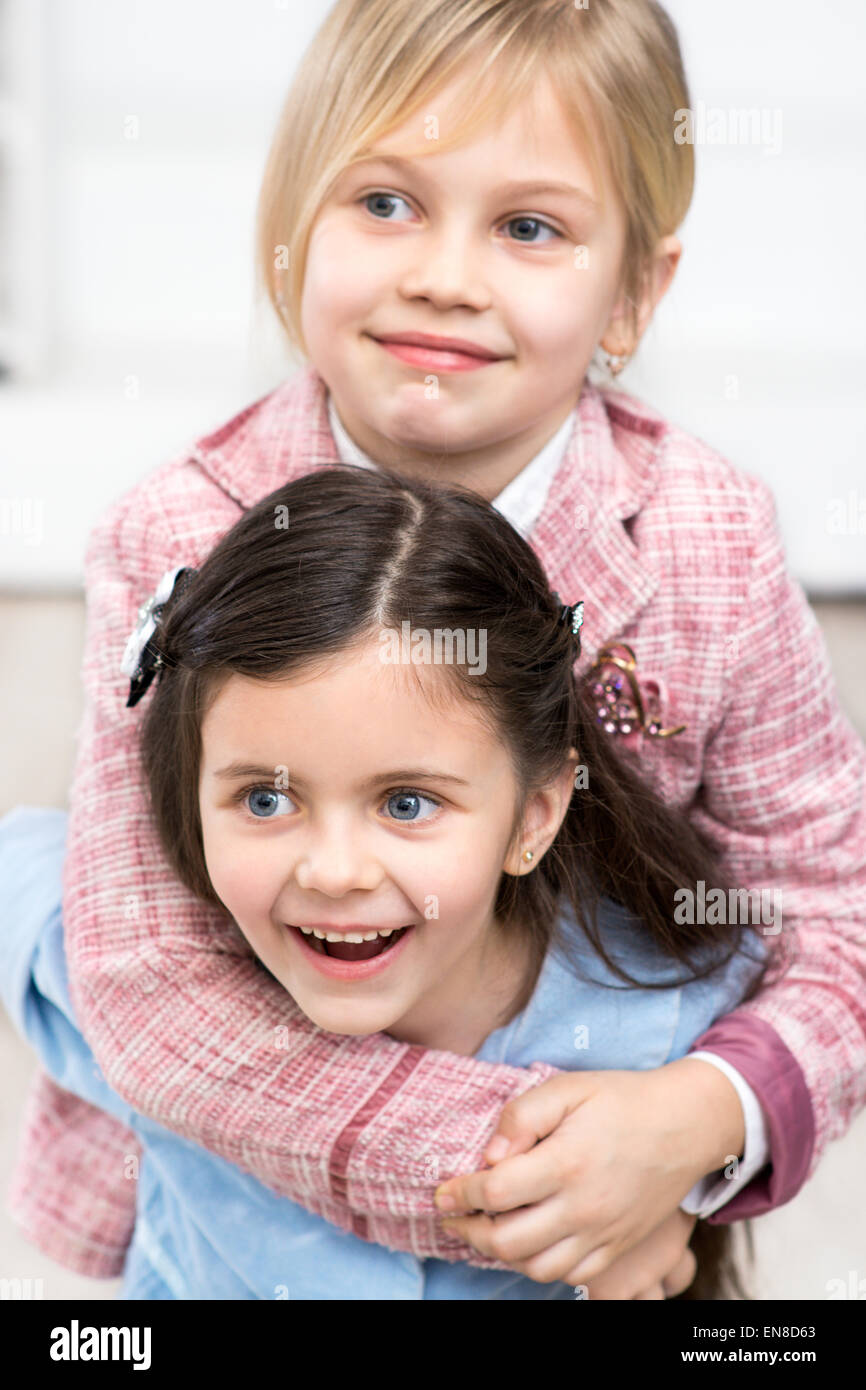 Two girls piddling and having fun together Stock Photo - Alamy