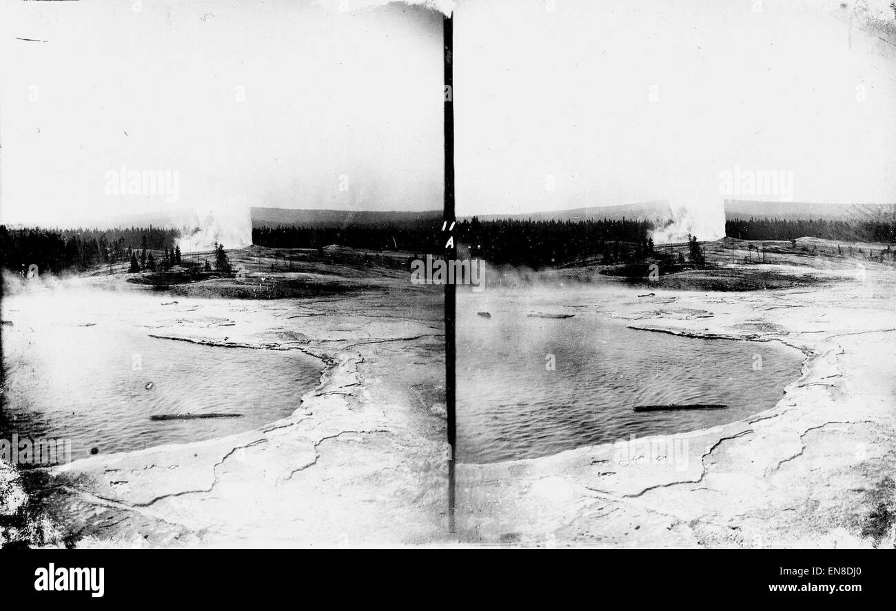Old Faithful Geyser, located in Yellowstone National Park, Wyoming, is ...