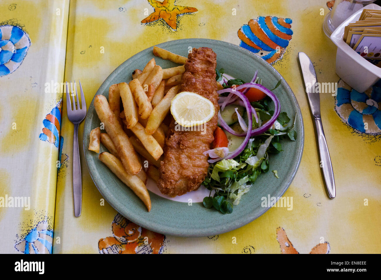 The traditional British dish - a plate of fried fish with batter top up ...
