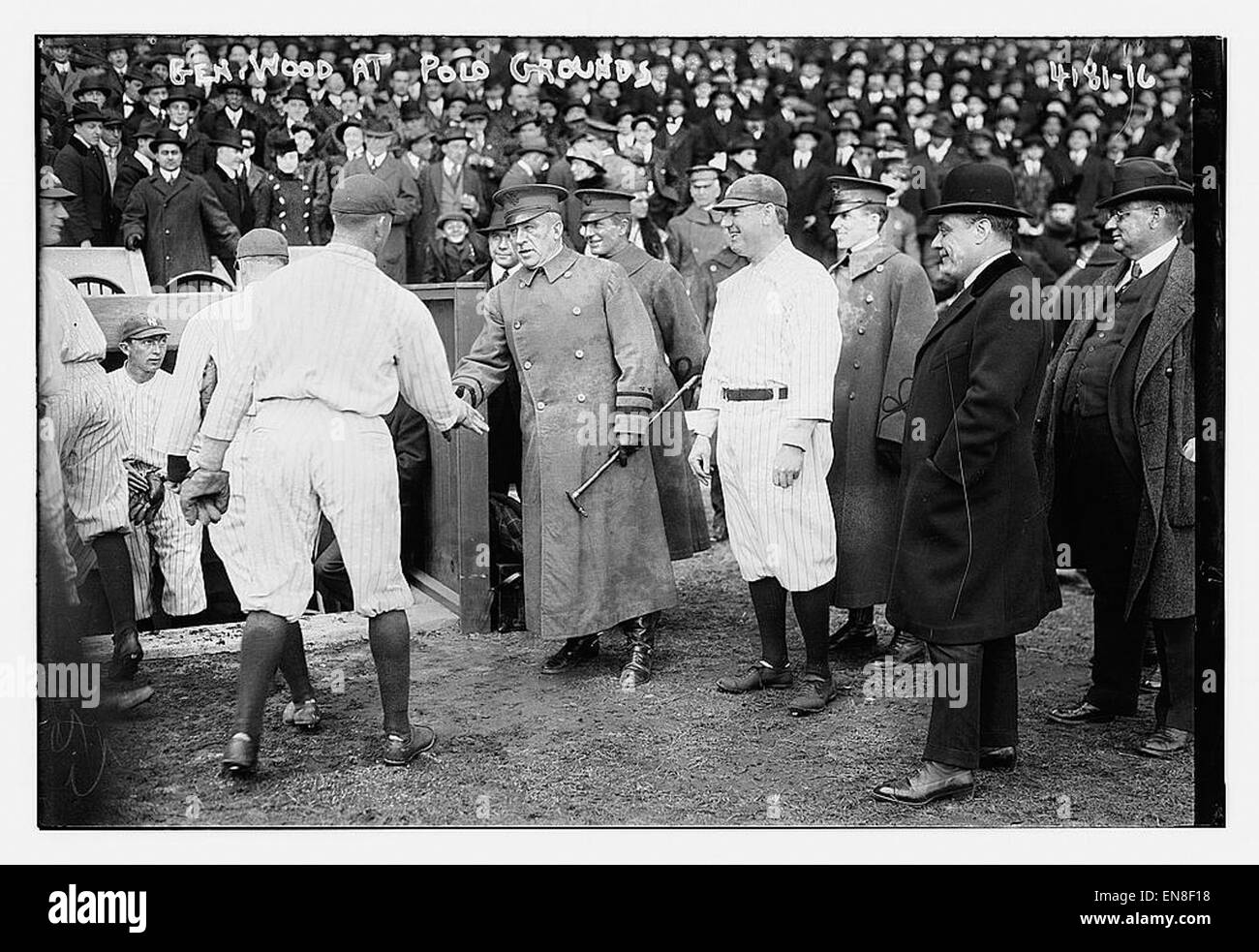 An iconic historical moment featuring Wild Bill Donovan, shaking hands ...
