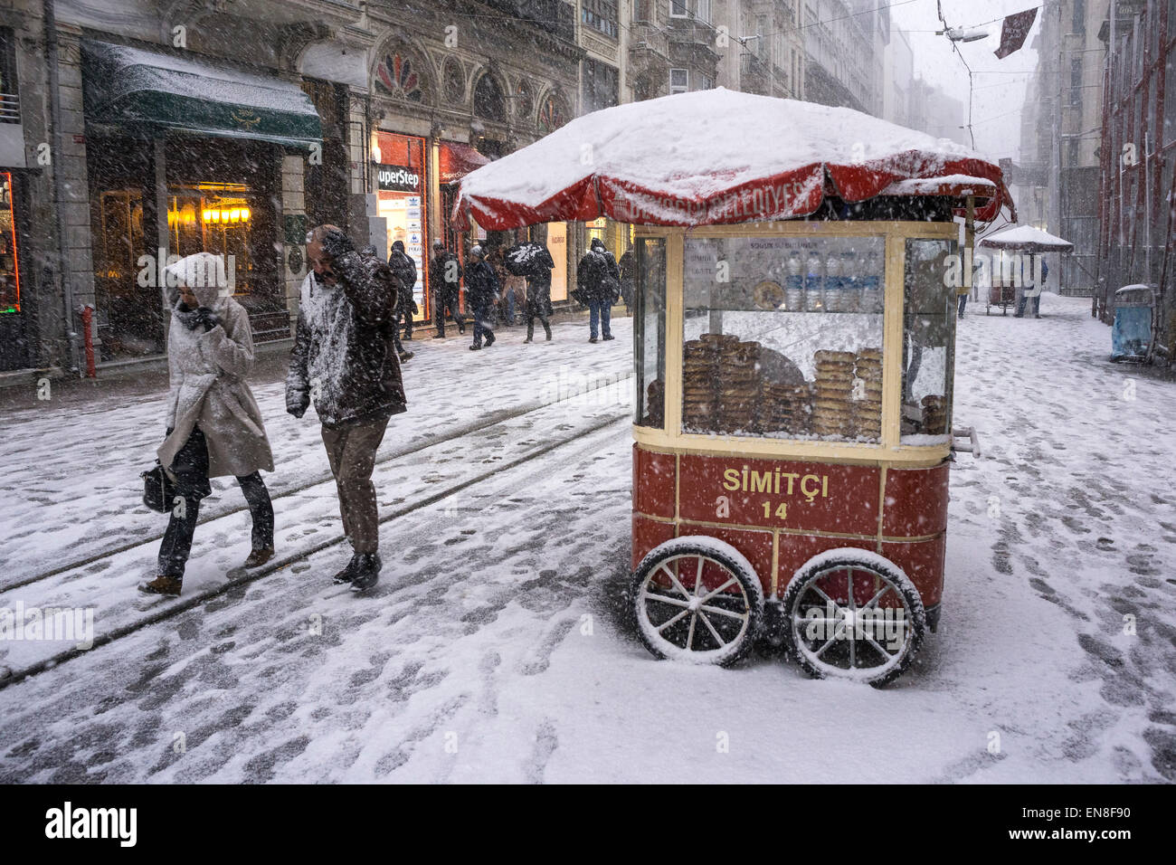 A simit bread stall during winter snow storm on Istiklal Caddesi ...