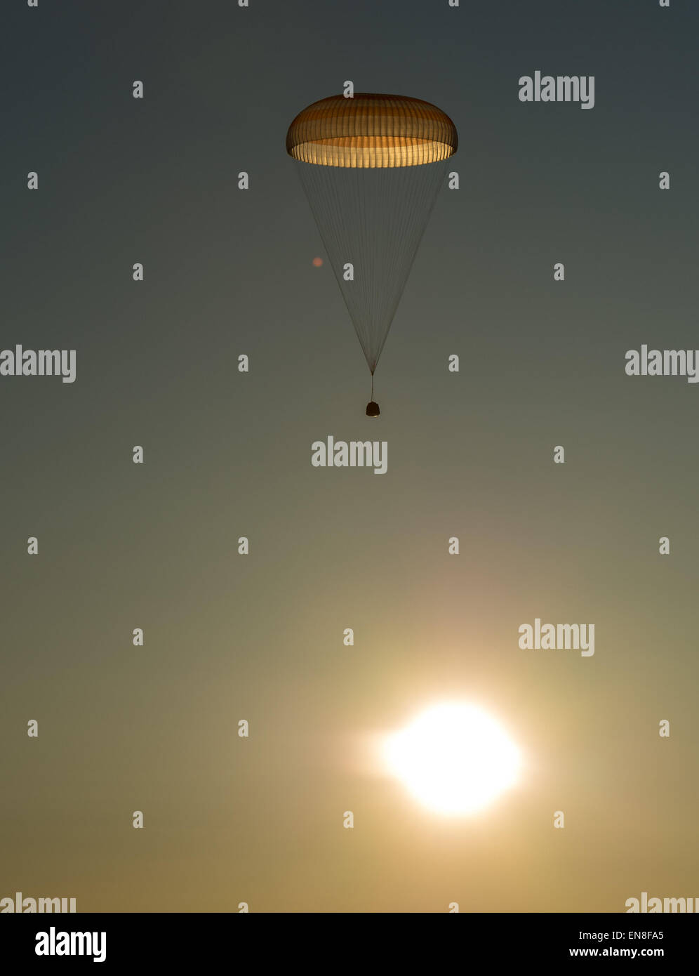 The Soyuz TMA-14M spacecraft lands in Kazakhstan, bringing Expedition ...